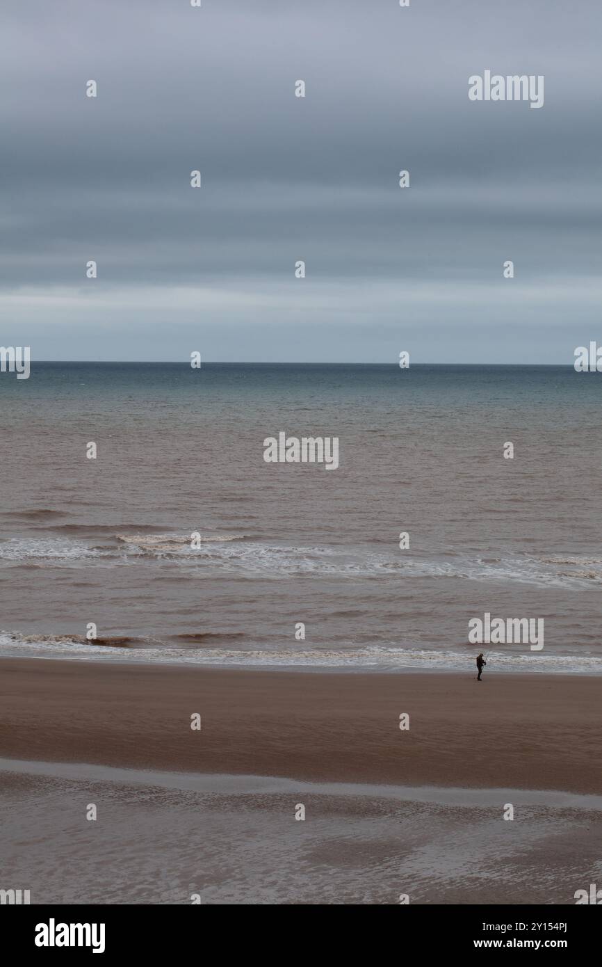 Fishing on beach at East Yorkshire Coast, England, UK Stock Photo - Alamy