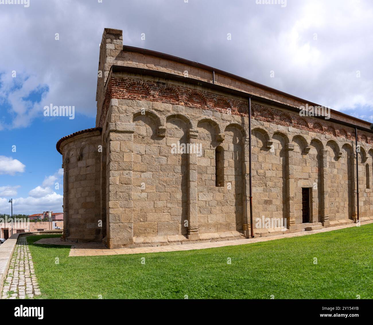Side view of the Basilica of San Simplicio, a historic 11th-century Romanesque church, located ...