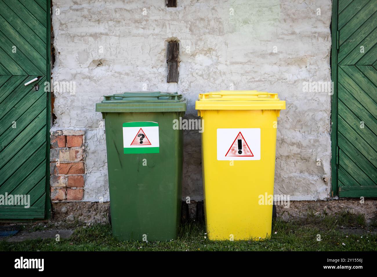 Waste recycling concept. Green and yellow waste sorting containers ...