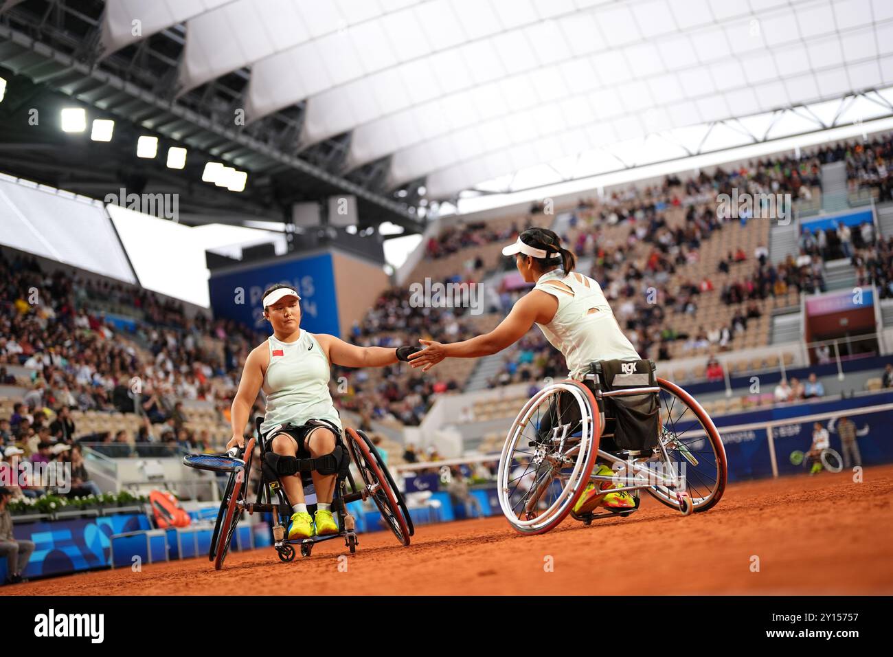 China's Zhenzhen Zhu (left) and Xiaohui Li in action during the Women's ...