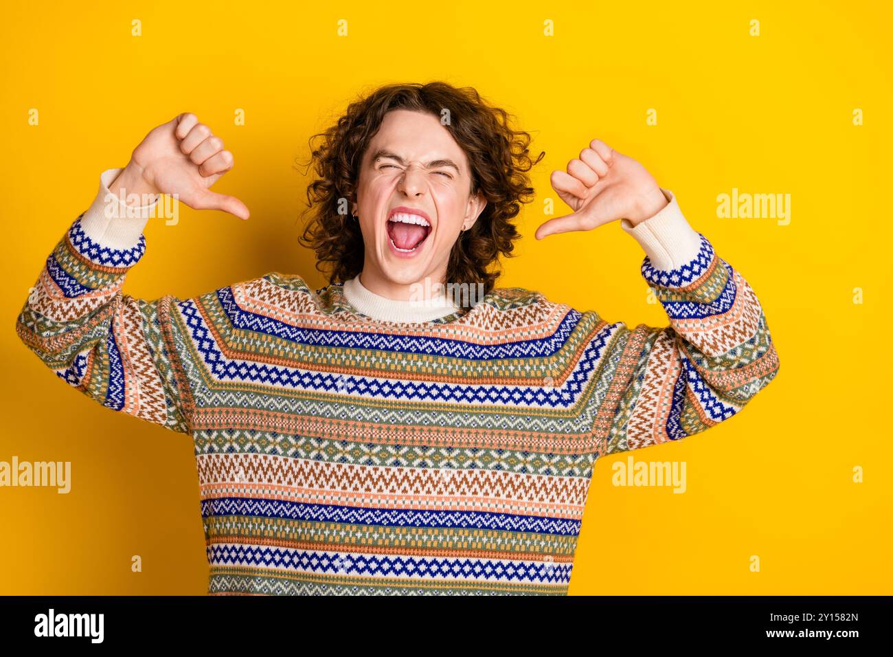 Photo of assertive eccentric guy with wavy hairdo dressed ornament ...