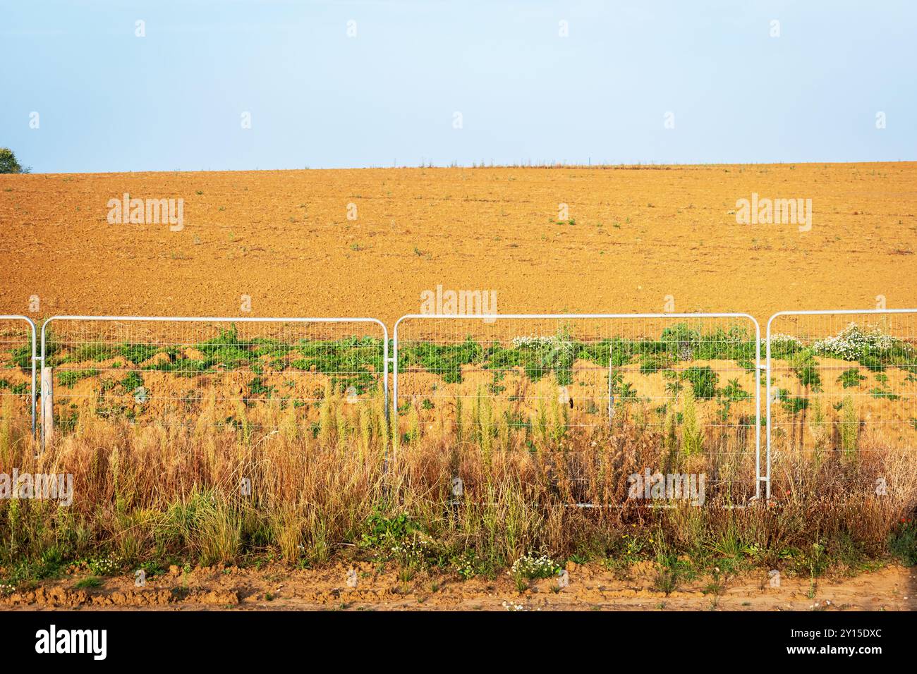 Fence around new build housing development estate in england uk Stock ...