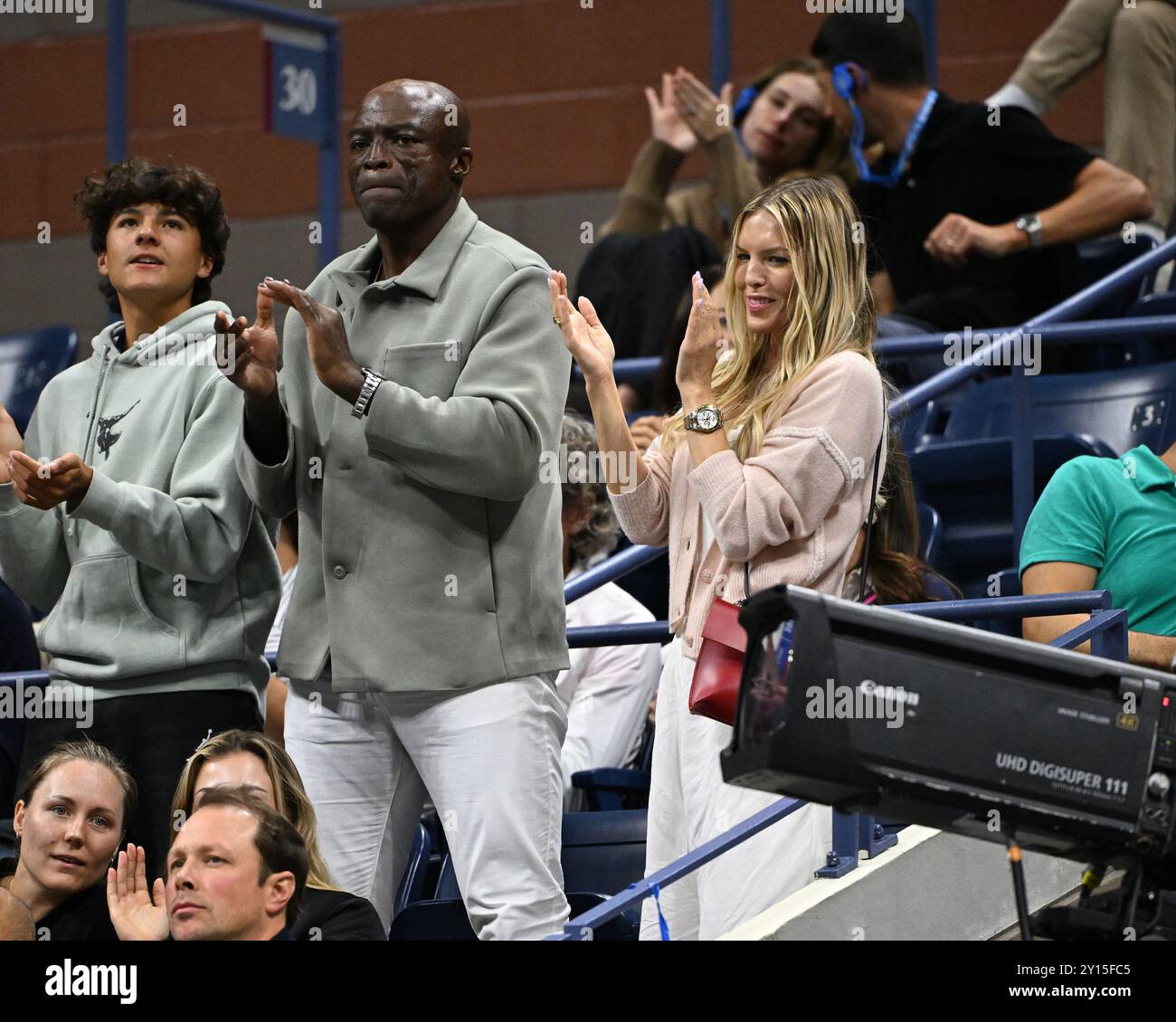 Flushing NY, USA. 04th Sep, 2024. **NO NY NEWSPAPERS** Seal and Laura Strayer are seen watching ...