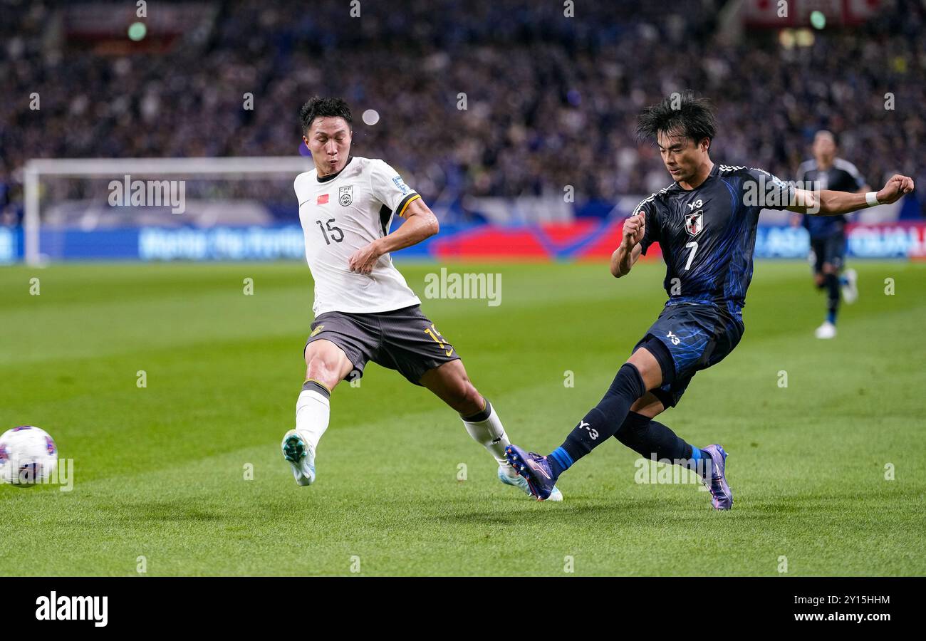 Saitama, Japan. 5th Sep, 2024. Yang Zexiang (L) of China vies with ...