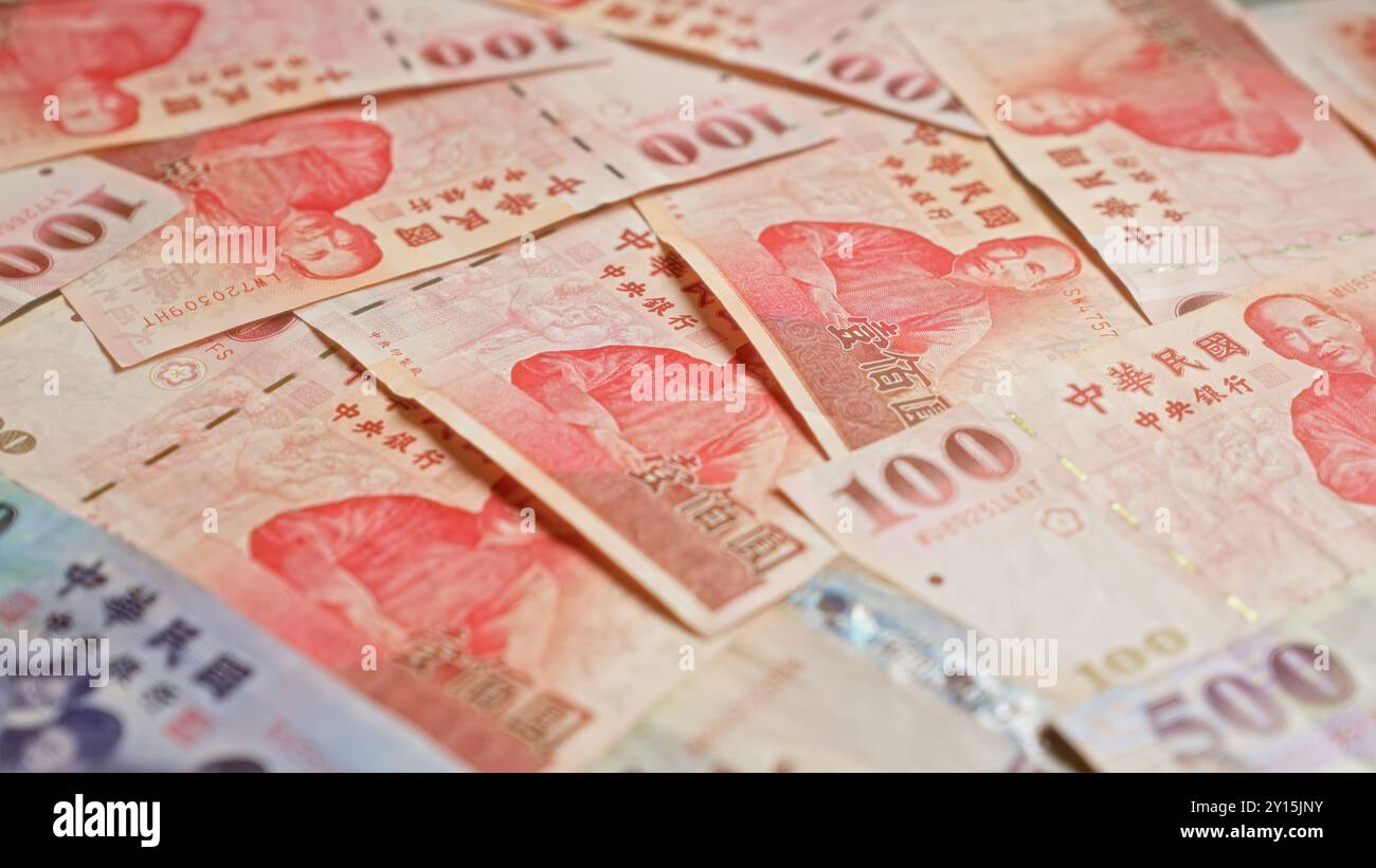 Chinese yuan banknotes scattered closely showcasing the vibrant and ...