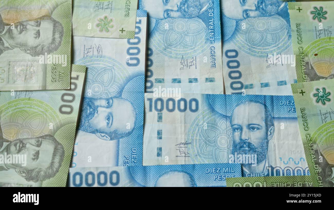 Chilean banknotes in denominations of 10000 and 1000 pesos scattered ...