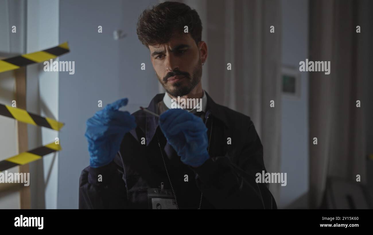 Hispanic detective man investigates a crime scene inside a house ...