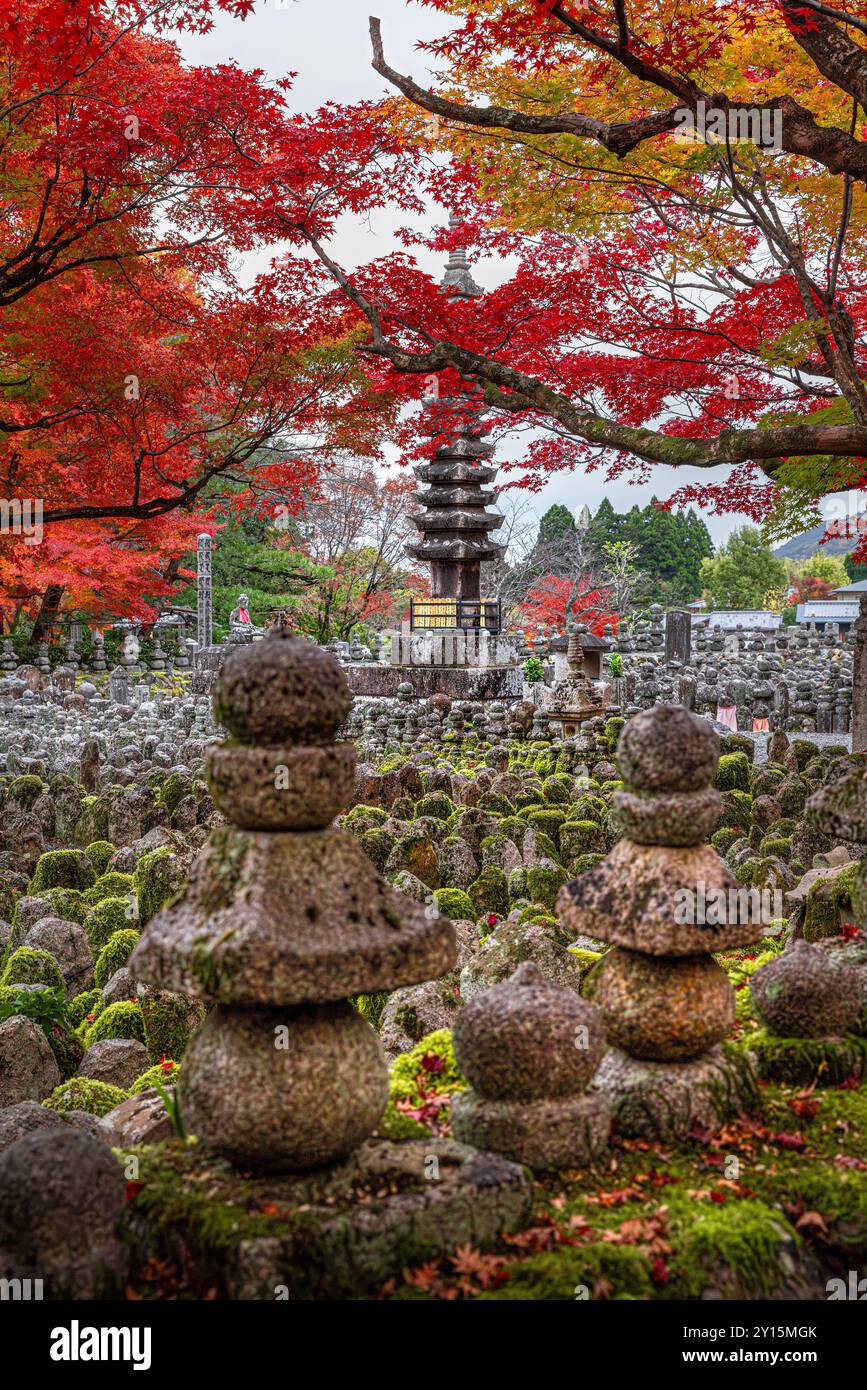 stone pagoda fall foliage background adashino nenbutsu-ji temple kyoto ...