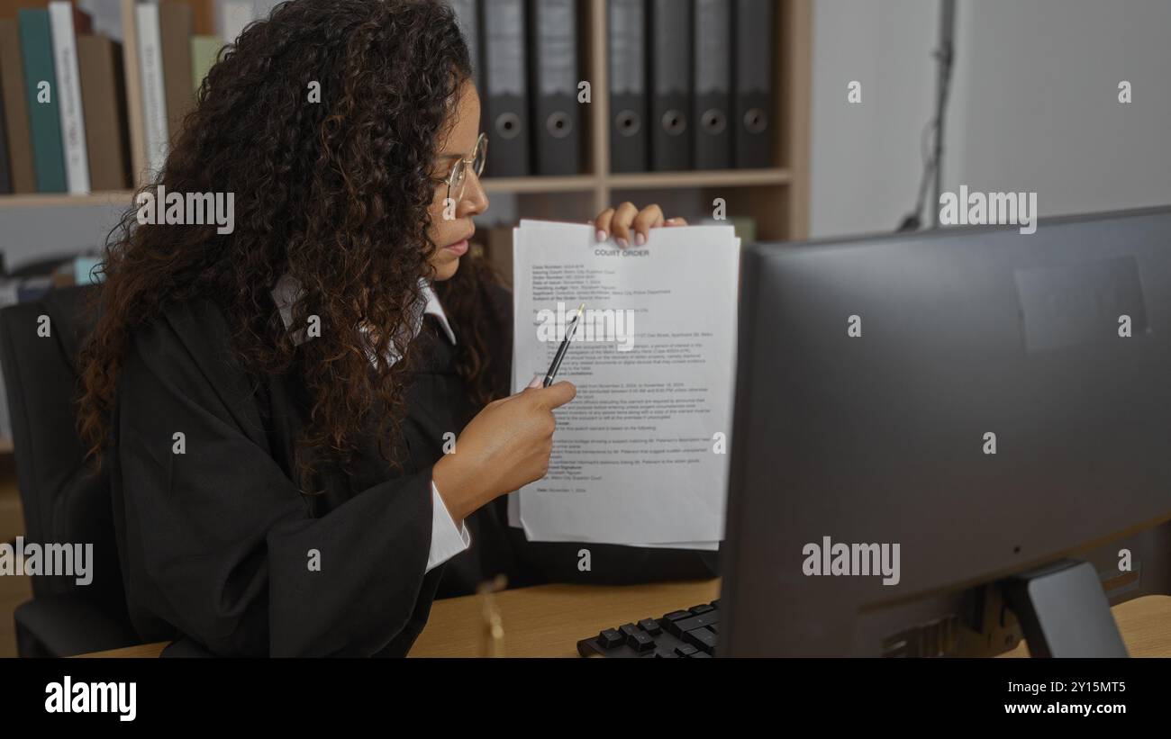Woman judge in office conducting a video call while presenting legal ...