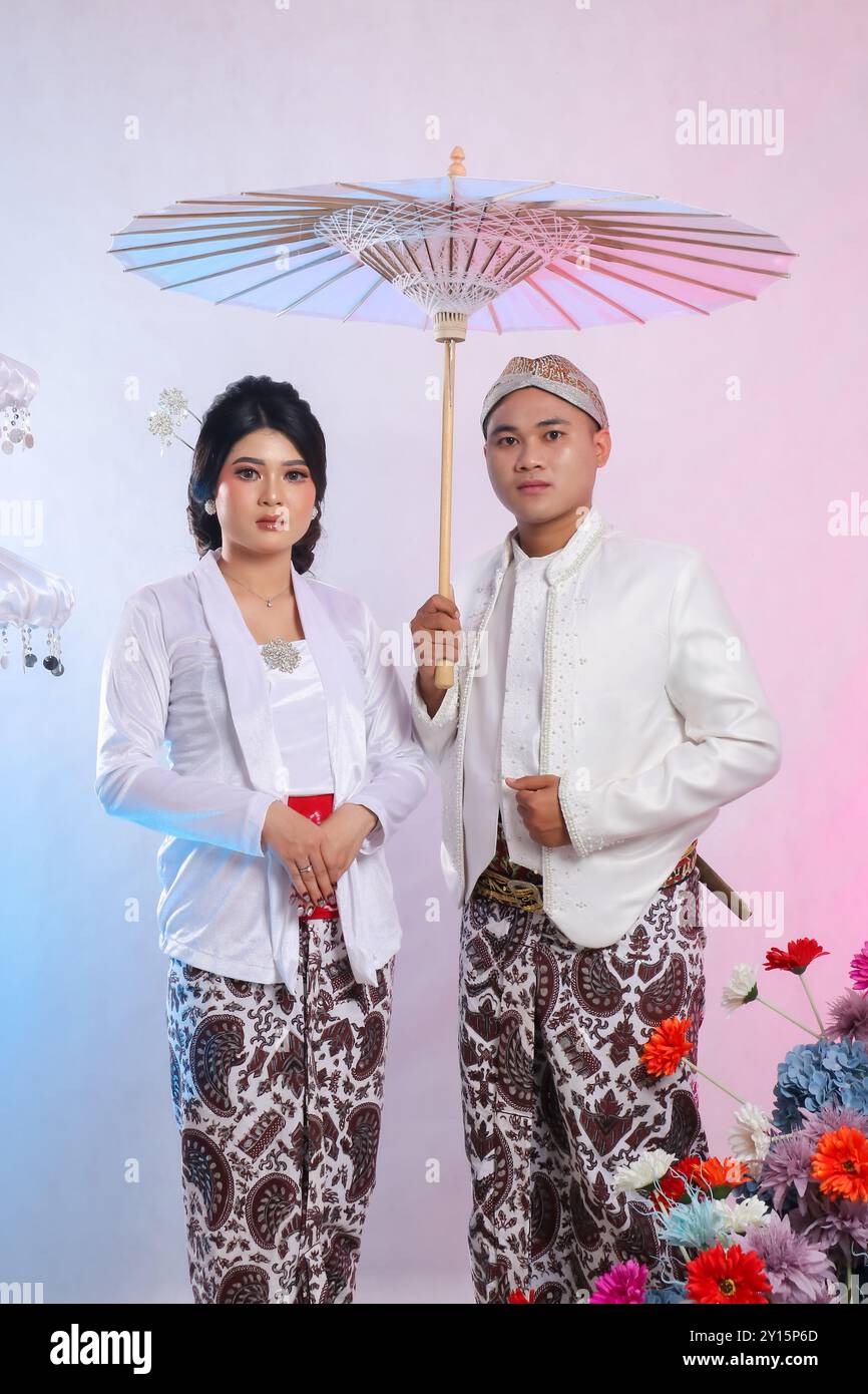 semi closeup of a adult indonesia men and woman lover standing ...