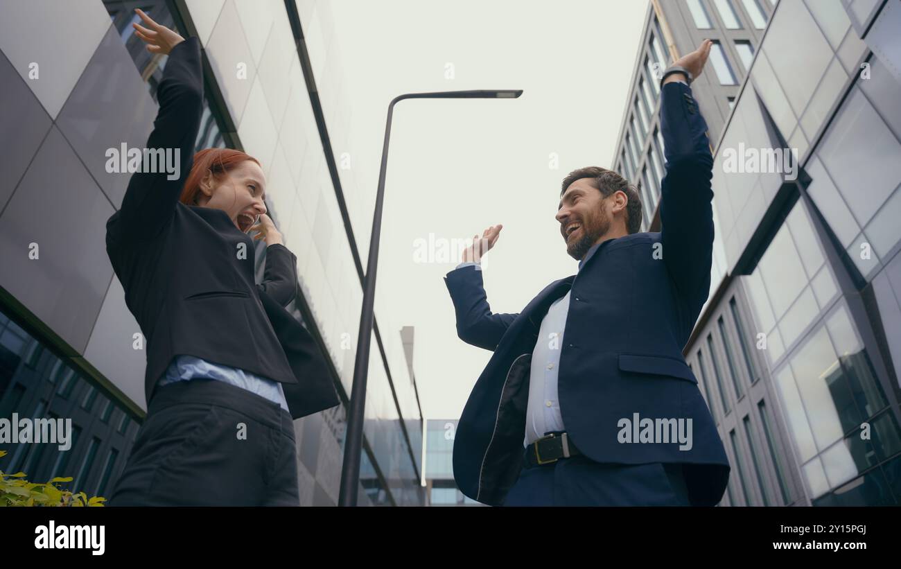 Happy successful smiling Caucasian business people stack hands put ...