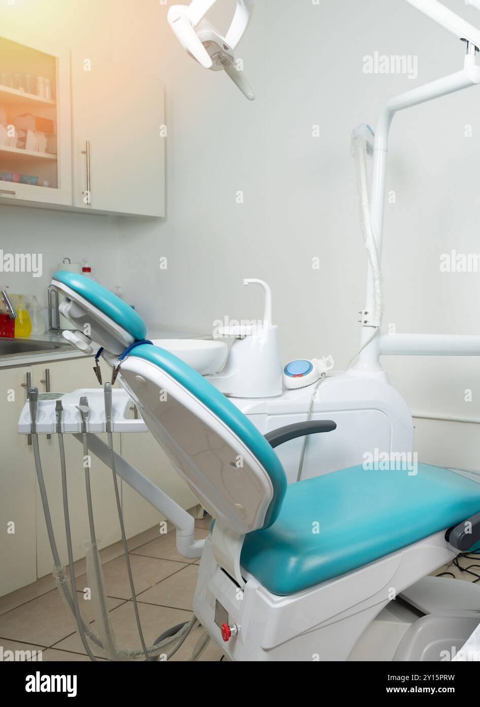 Dental clinic room with empty chair and accessories Stock Photo - Alamy
