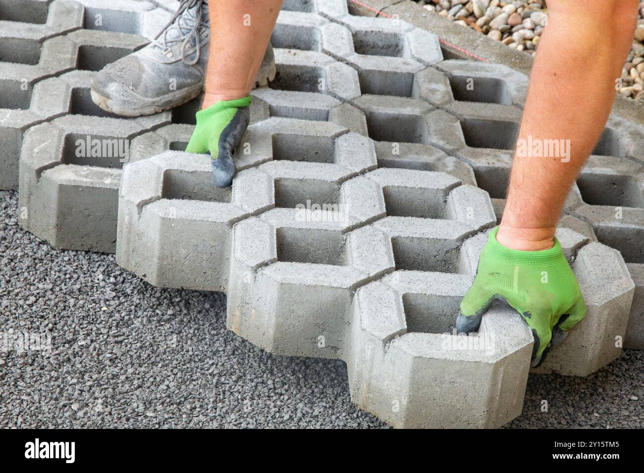 Paving work: Laying of grass pavers Stock Photo - Alamy