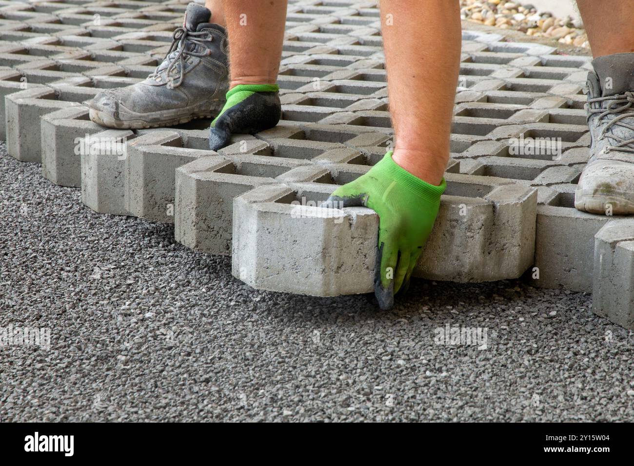 Paving work: Laying of grass pavers Stock Photo - Alamy