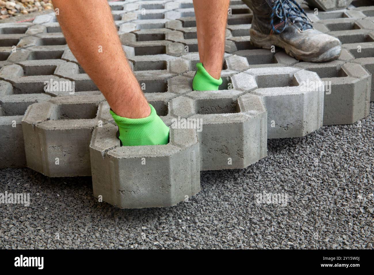 Paving work: Laying of grass pavers Stock Photo - Alamy