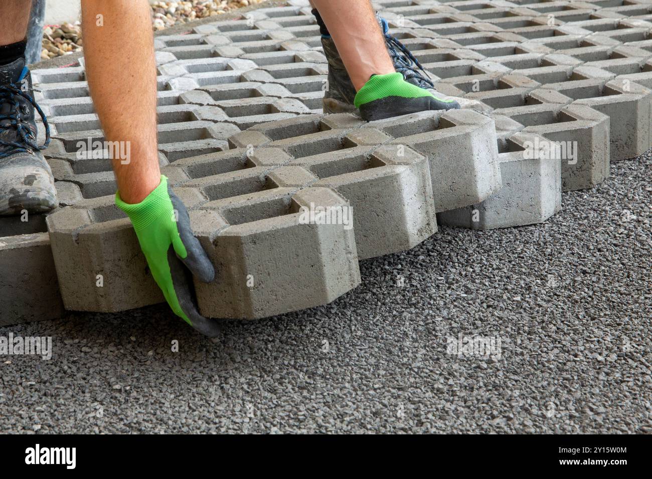 Paving work: Laying of grass pavers Stock Photo - Alamy