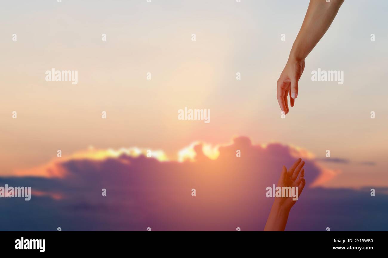 God's help and support. Human reaching for hand from heaven Stock Photo ...