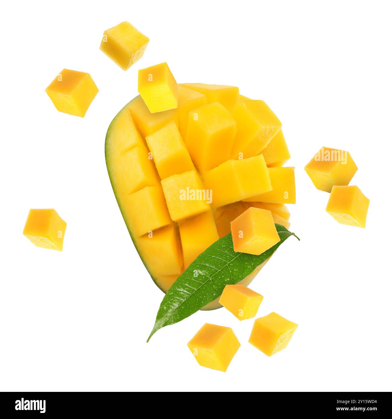 Sweet fresh mango cut in cubes flying on white background Stock Photo ...