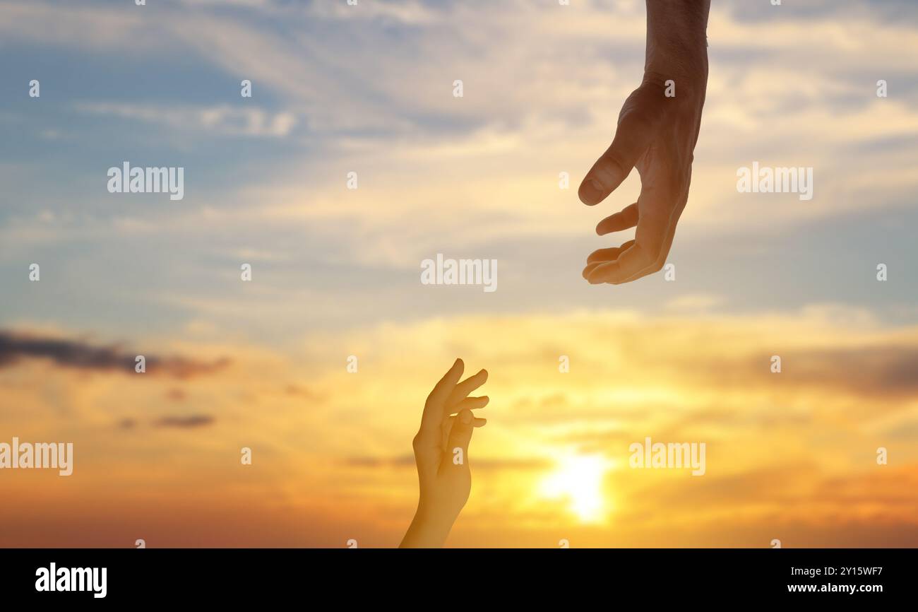God's help and support. Human reaching for hand from heaven Stock Photo ...