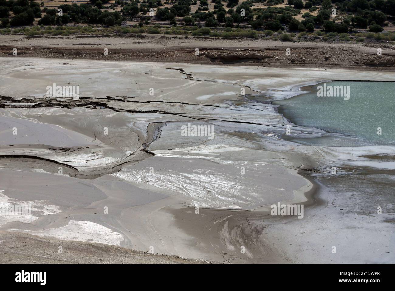 The dry shore of Lake Mornos. At the beginning of July, water levels at ...