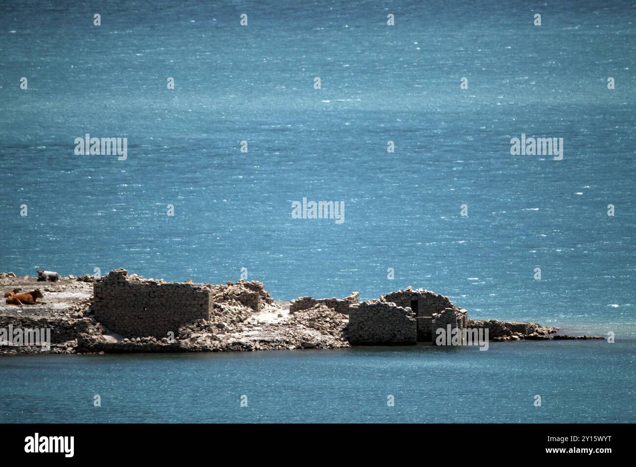 In dry periods this Greek village emerges from the lakebed. At the ...