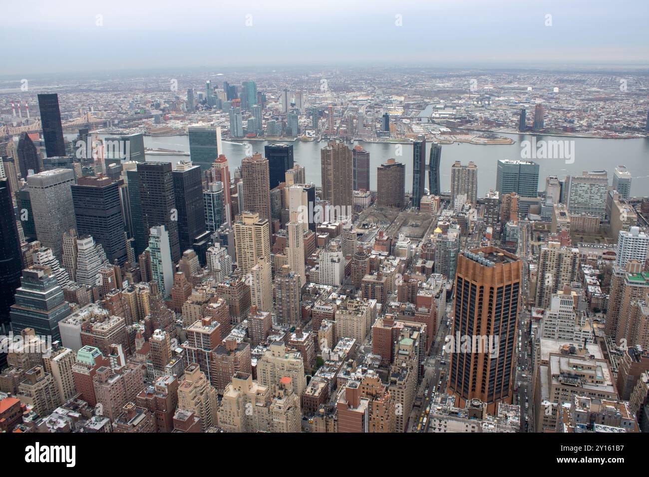 Aerial view of Manhattan in New York City showing the classic high rise buildings and city scape ...