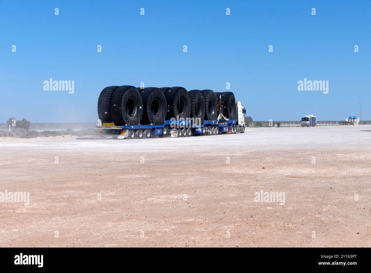 Truck transporting large tyres, South Australia Stock Photo - Alamy