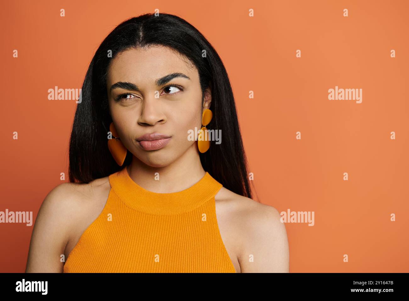 A confident African American woman showcases her unique expression ...