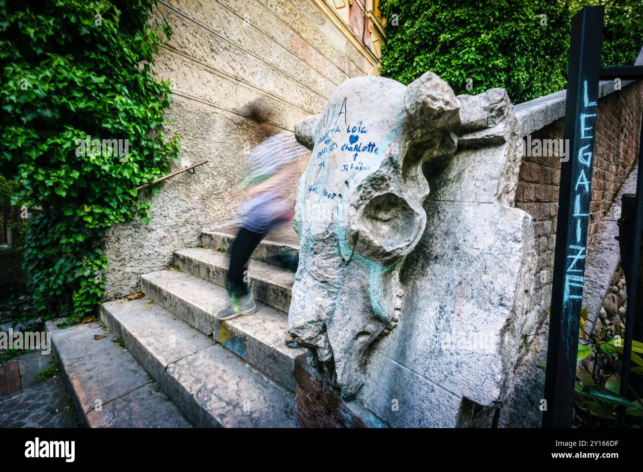 Lady climbing the stairs of San Pietro Castle, Verona, UNESCO World ...