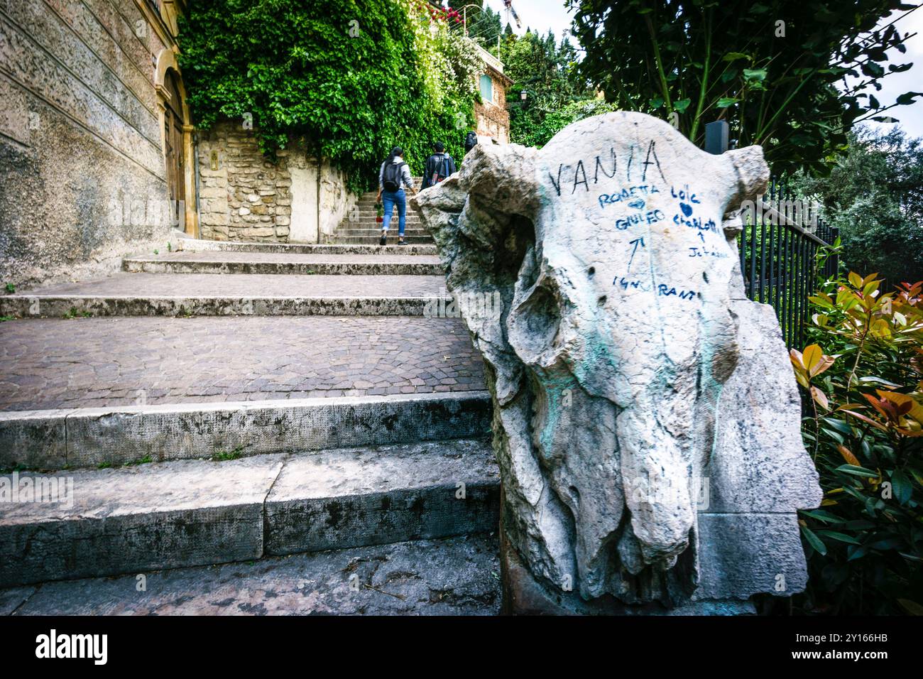 Lady climbing the stairs of San Pietro Castle, Verona, UNESCO World ...