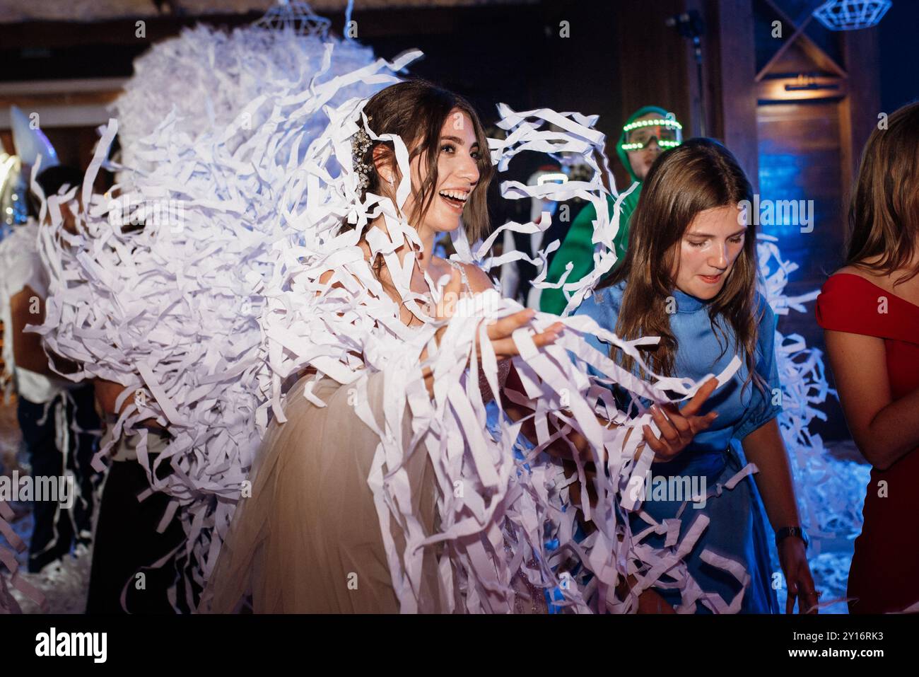 paper show with paper ribbons in the banquet hall, bright emotions ...