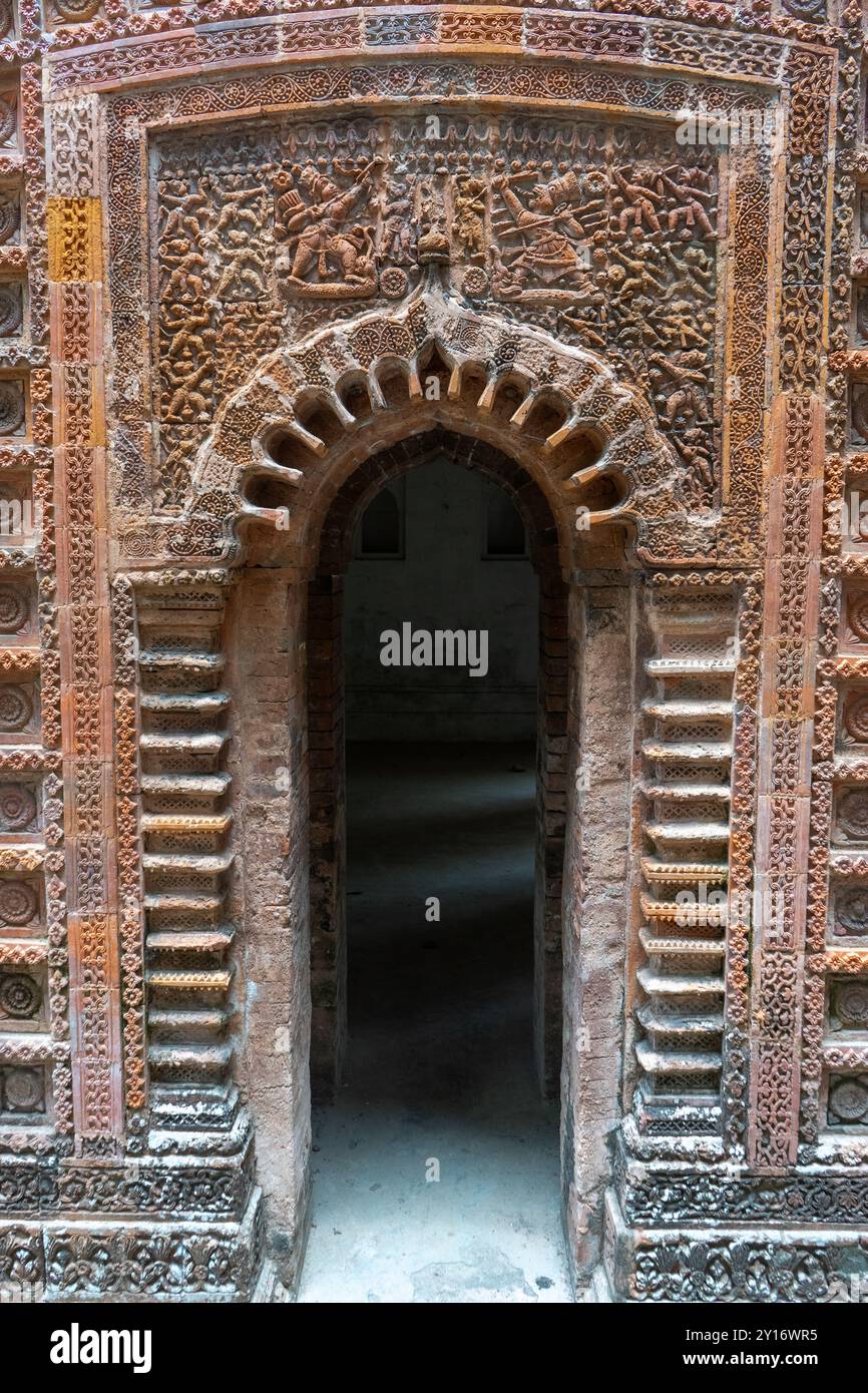 Entrance arch decorated with terracotta carvings in Pancha Ratna ...