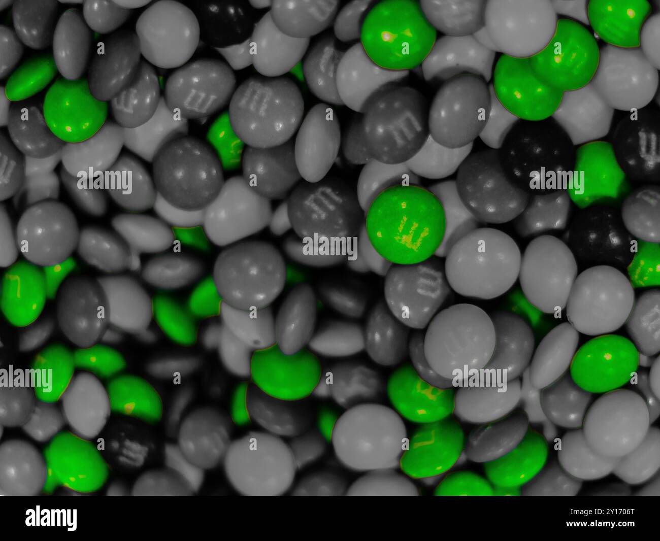 Pile of Green and Black-and-White Candy with Selective Color Effect ...