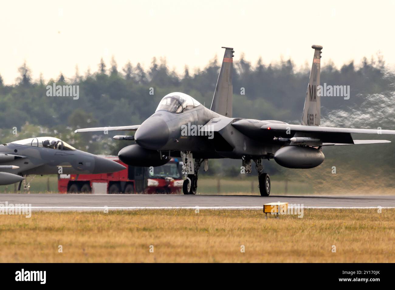 US Air Force F-15C Eagle fighter jet from 104th Fighter Wing taking off from Hohn Airbase during ...