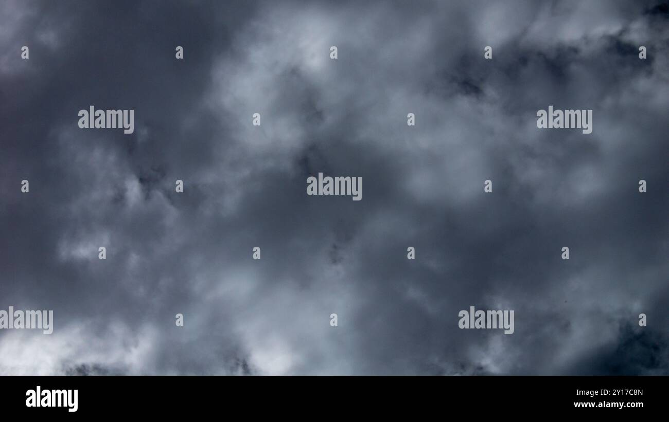 Dark storm clouds casting shadows hi-res stock photography and images ...