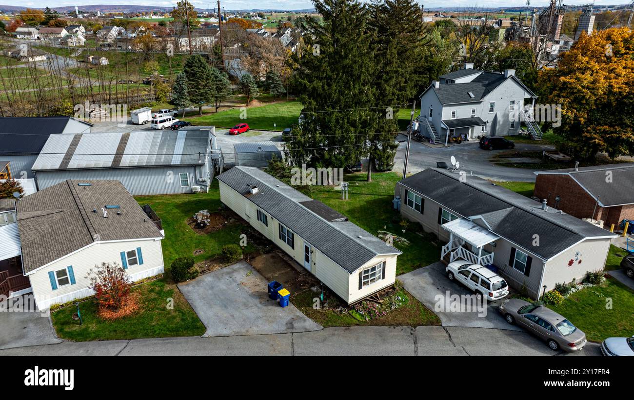 Various Mobile, Prefab, Manufactured, homes are seen in a rural setting ...