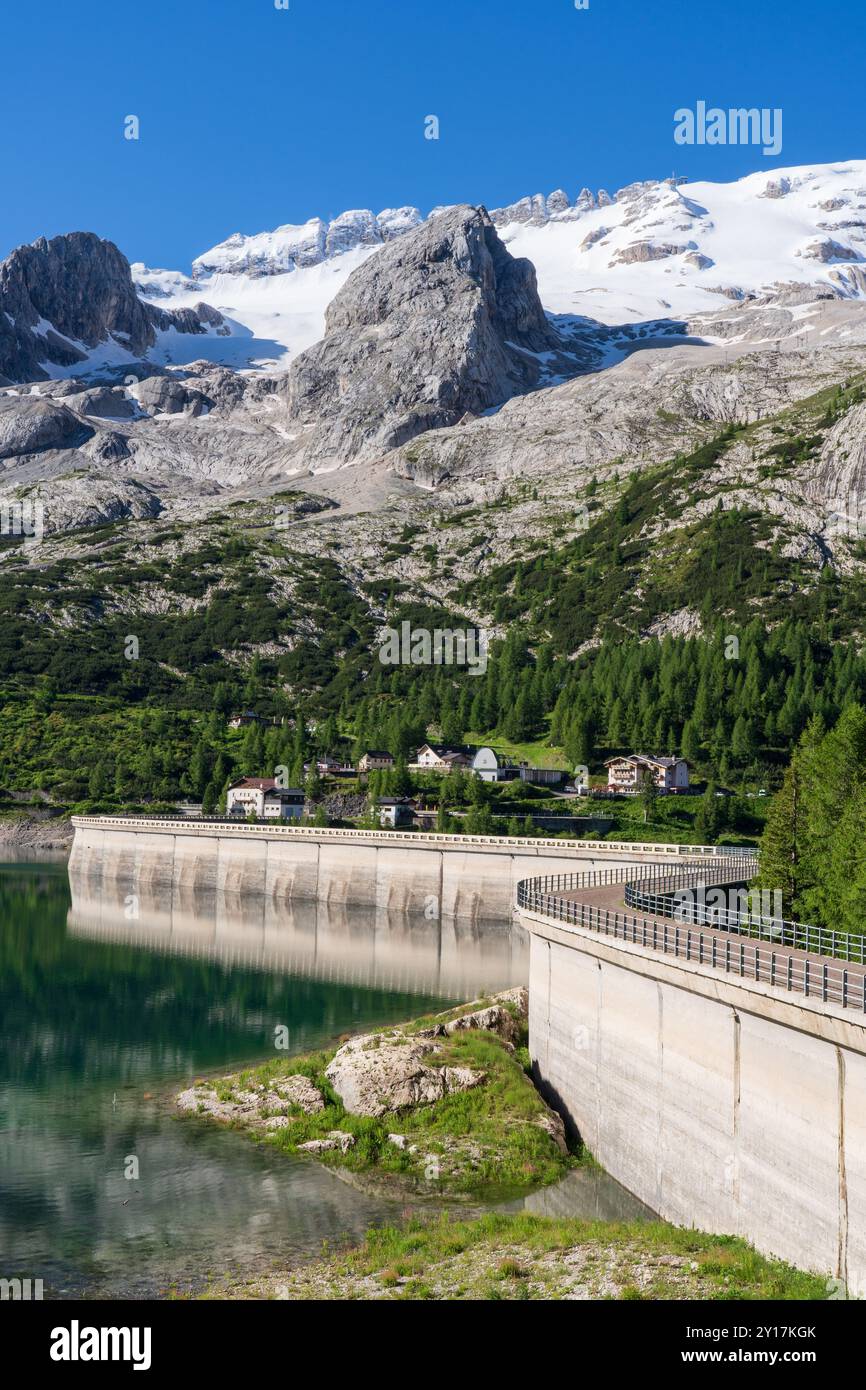 Fedaia lake and dam, water reflection, Marmolada massif group ...