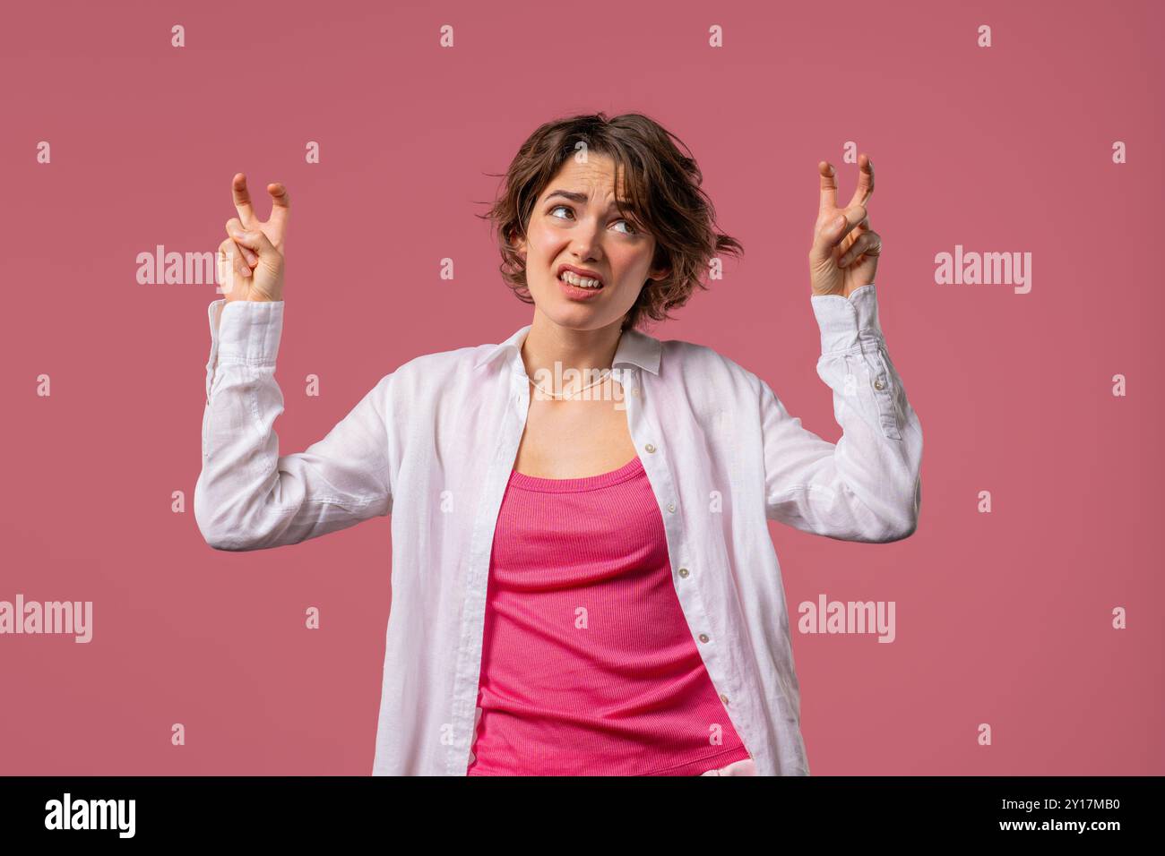 Woman showing air quotes hands hi-res stock photography and images - Alamy