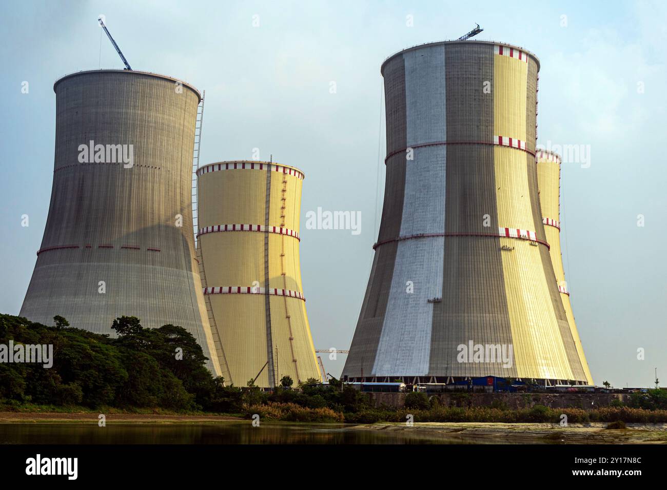 Cooling towers of Rooppur NPP during painting process Stock Photo - Alamy