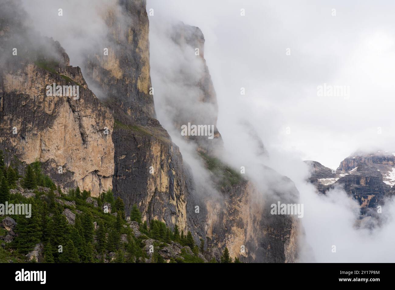 rocky mountain peaks in the clouds, sella towers, dolomites, italian ...