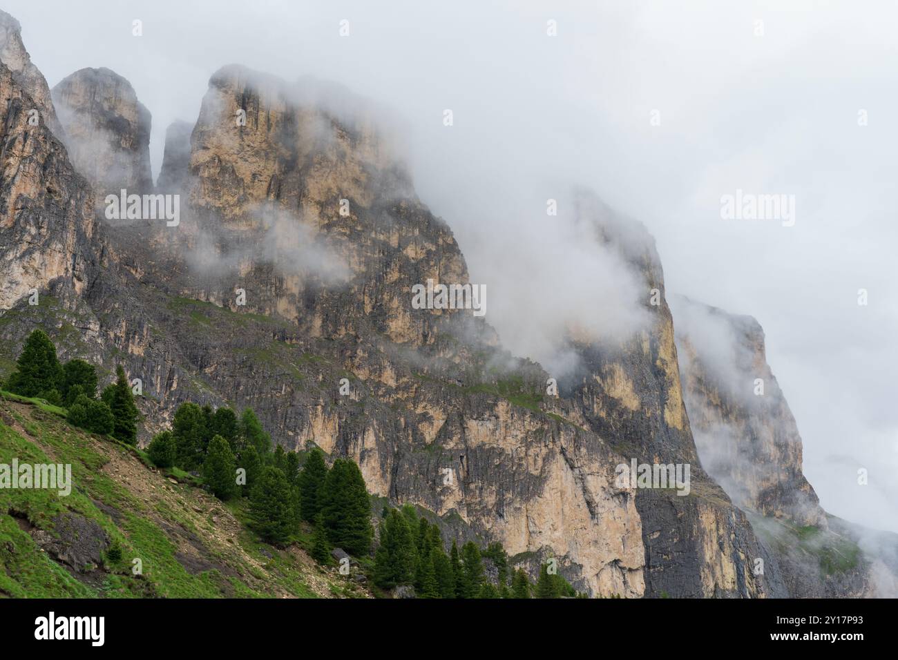rocky mountain peaks in the clouds, sella towers, dolomites, italian ...