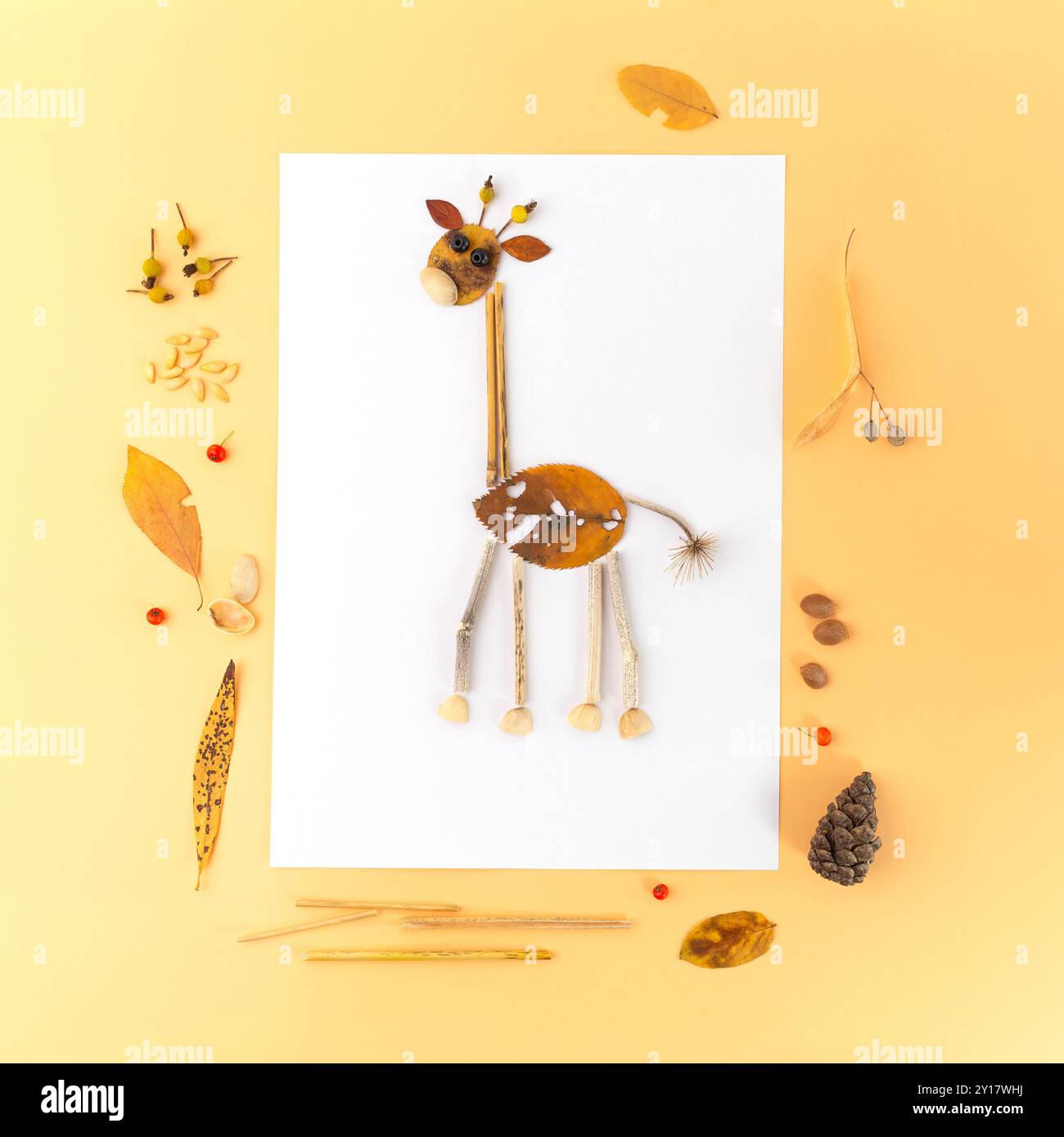 Creative representation of a giraffe made from various objects. Long ...