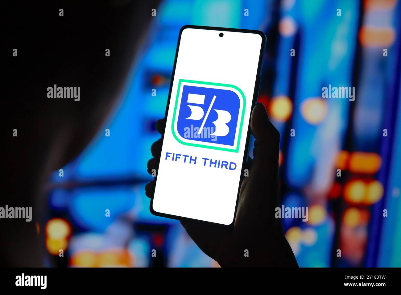 In this photo illustration, the Fifth Third Bank logo is displayed on a ...