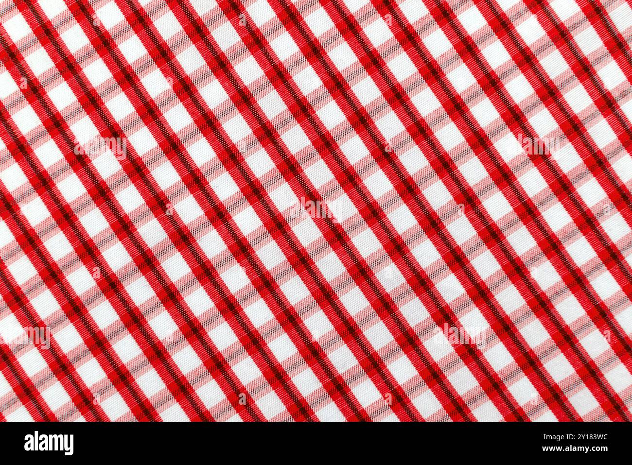 Checkered red fabric. Textile. Checkered fabric background with red and ...