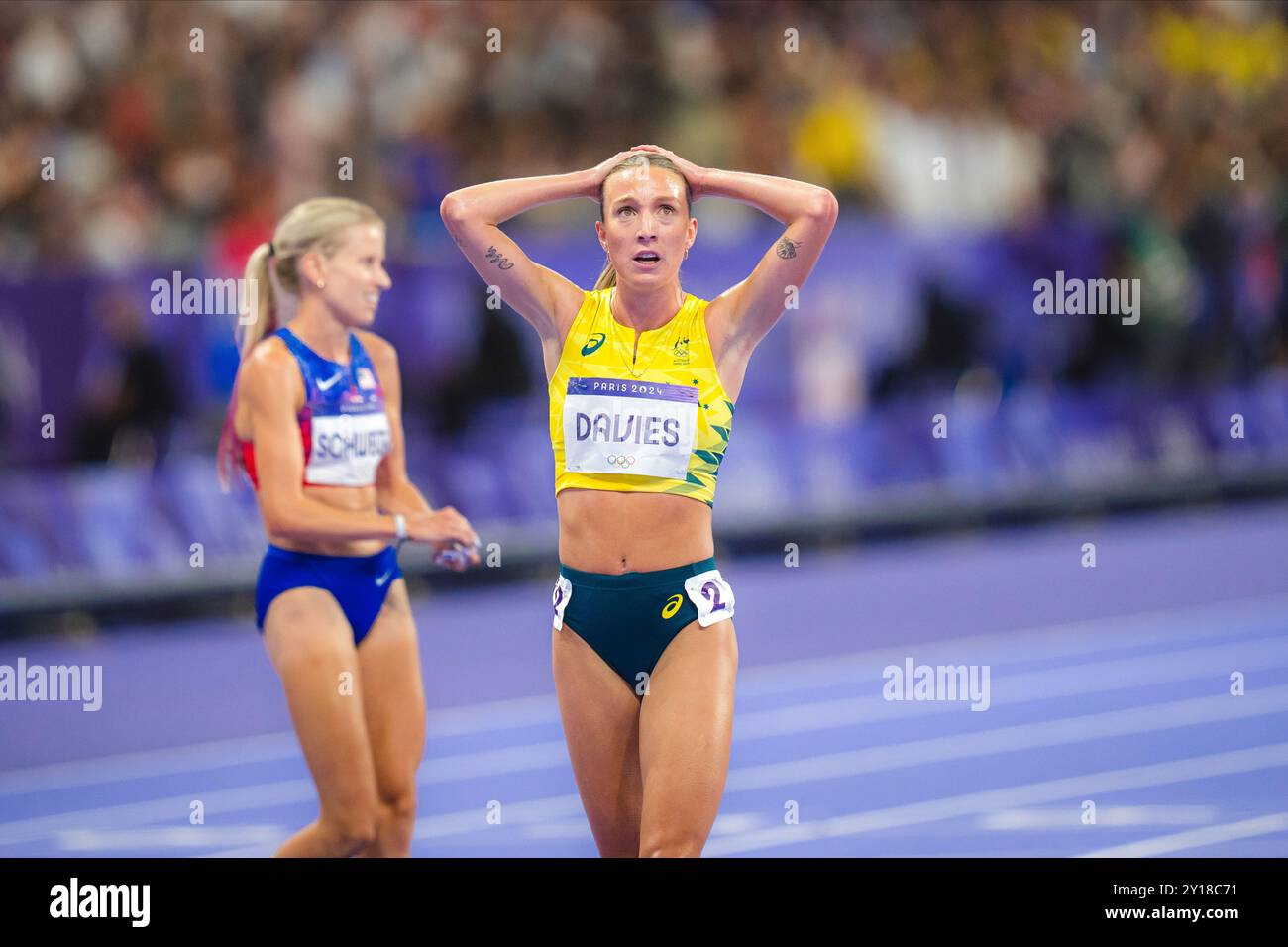 Rose Davies participating in the 5000 meters at the Paris 2024 Olympic ...