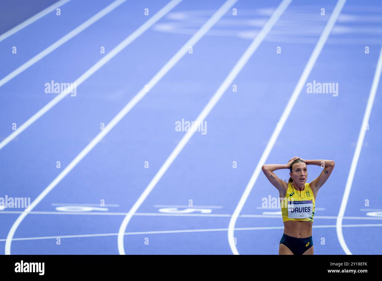 Rose Davies participating in the 5000 meters at the Paris 2024 Olympic ...