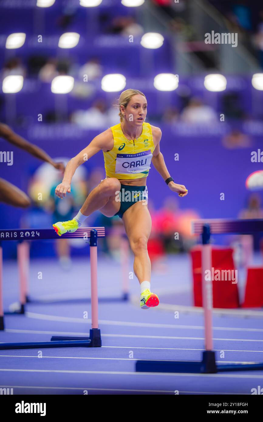 Sarah Carli participating in the 400 meters hurdles at the Paris 2024 ...