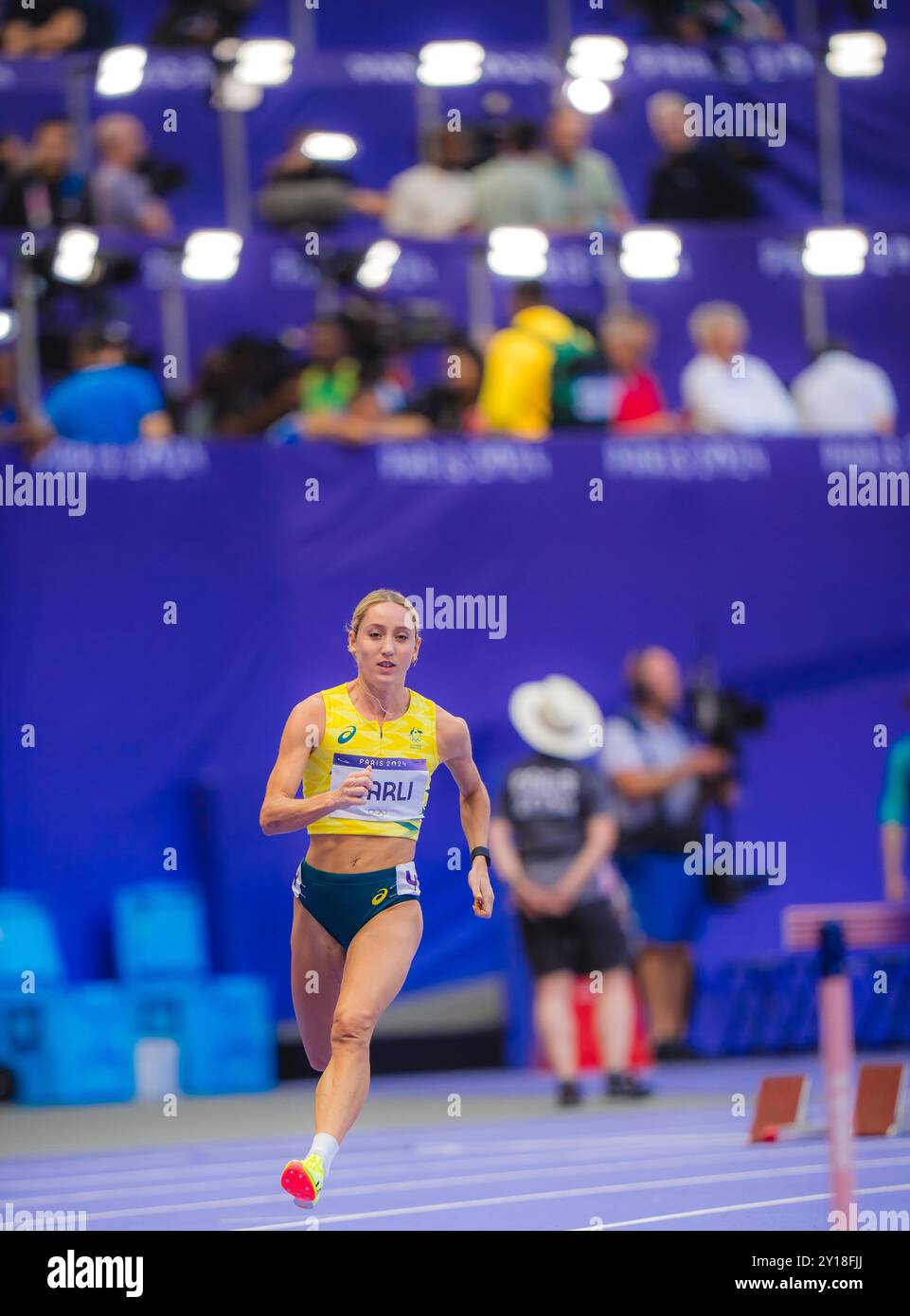 Sarah Carli participating in the 400 meters hurdles at the Paris 2024 ...
