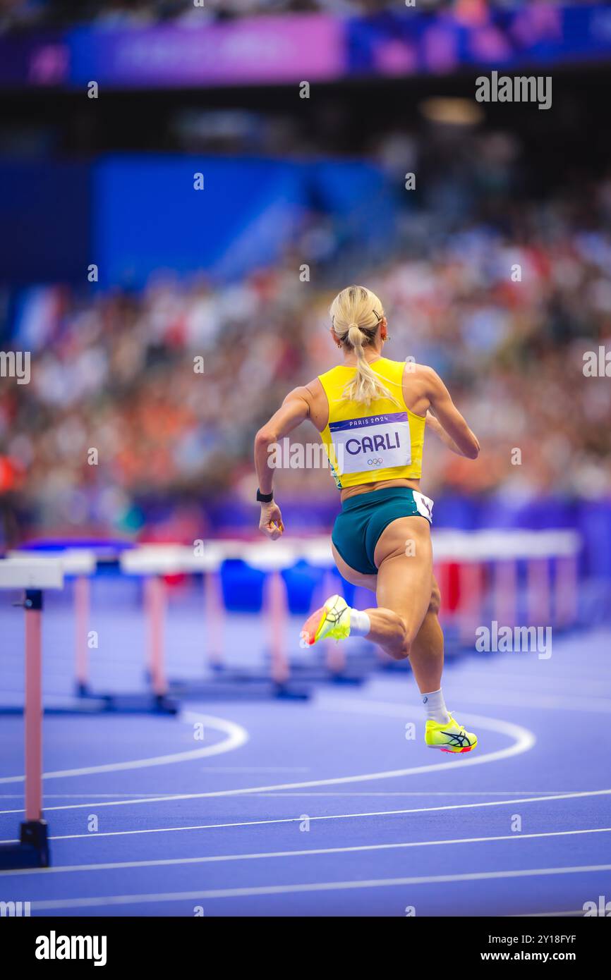 Sarah Carli participating in the 400 meters hurdles at the Paris 2024 ...