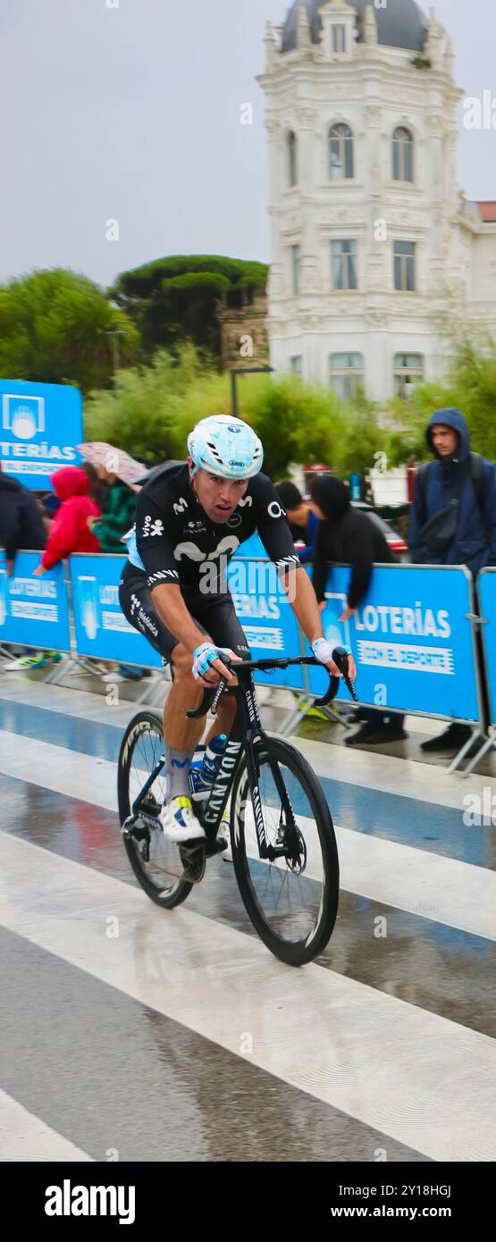 Cyclists competing in the 17th stage of the Vuelta de Espana in pouring ...